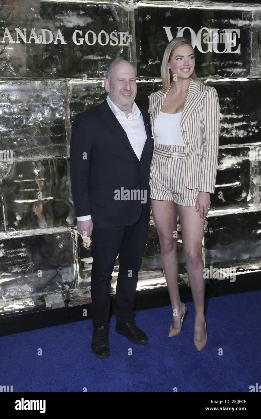 Dani Reiss (CEO of Goose Canada) and Kate Upton walking the red carpet ...