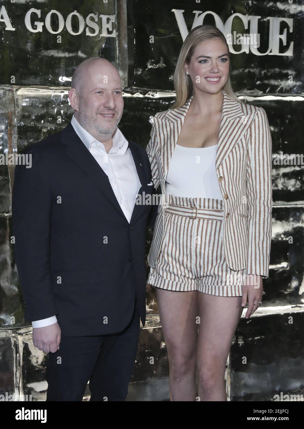 Dani Reiss (CEO of Goose Canada) and Kate Upton walking the red carpet ...