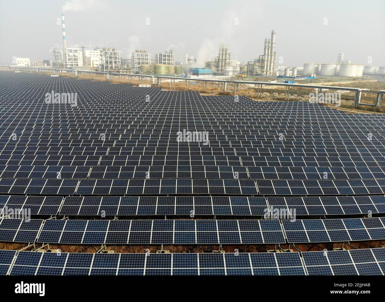 View of arrays of solar panels at a photovoltaic power station in ...