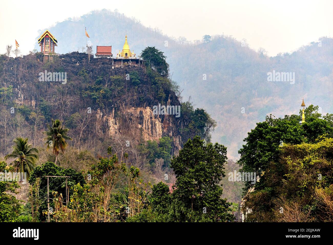 The Phuttha Chethiya Khiri Pagoda sits on top of a limestone carst ...