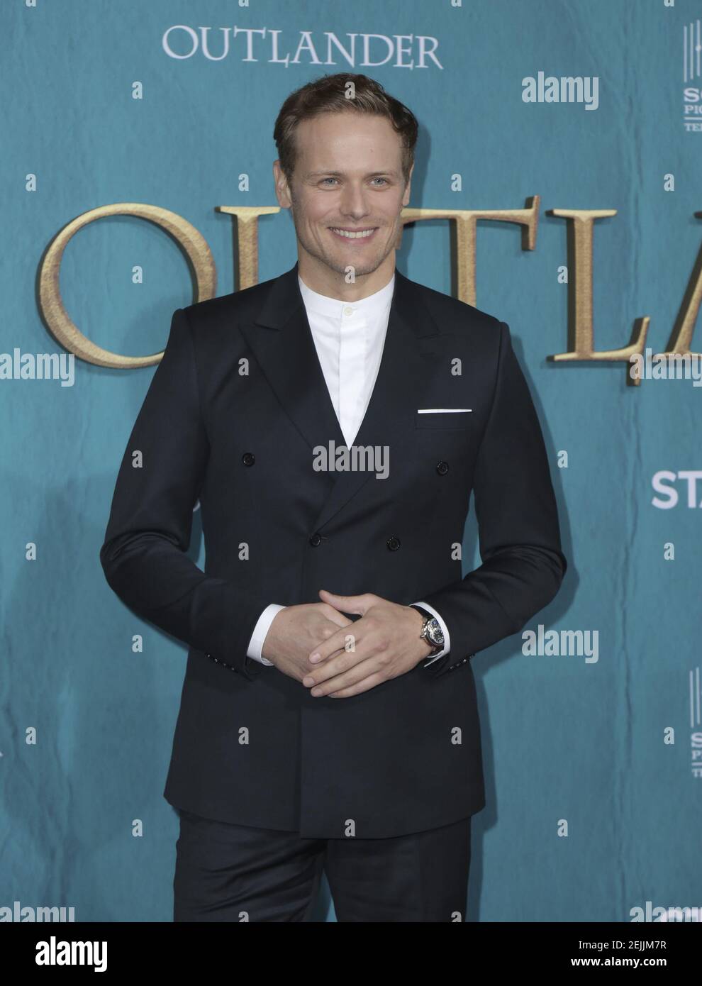 Sam Heughan walking the red carpet at the Starz Premiere Event For ...