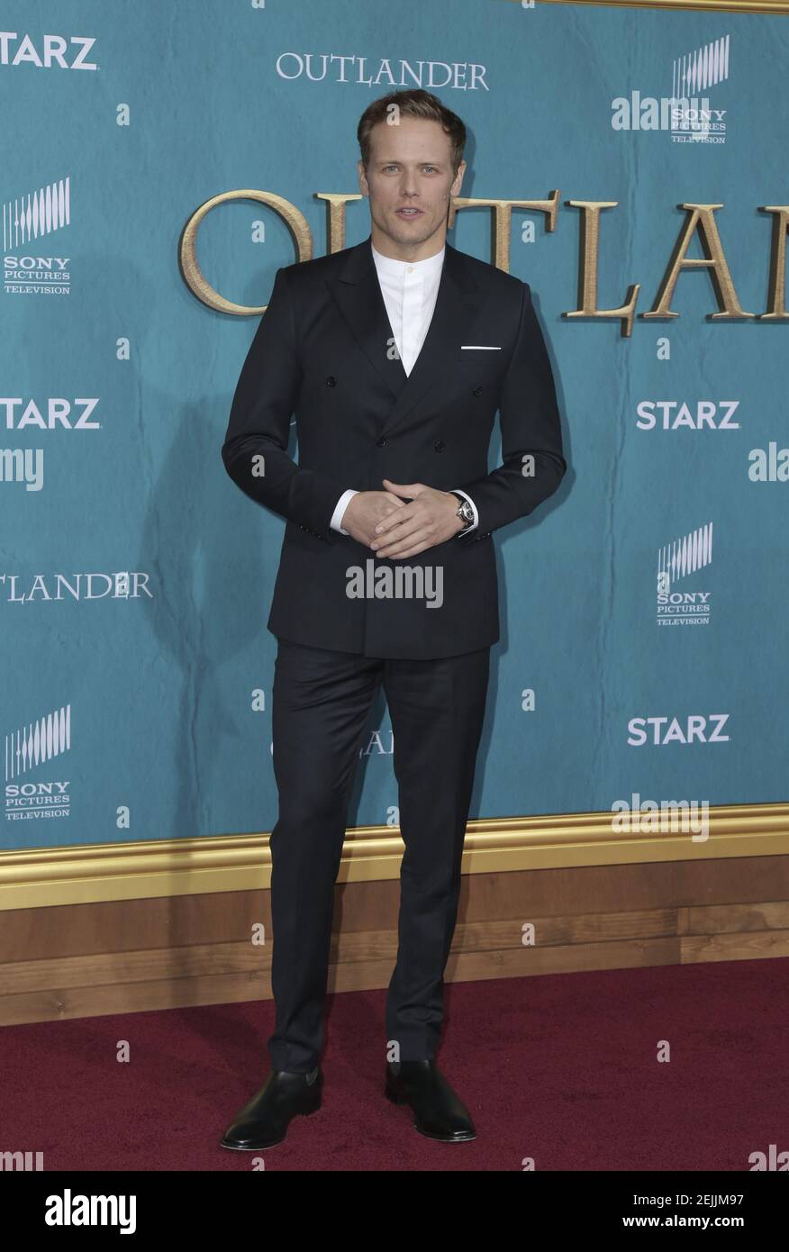 Sam Heughan walking the red carpet at the Starz Premiere Event For ...