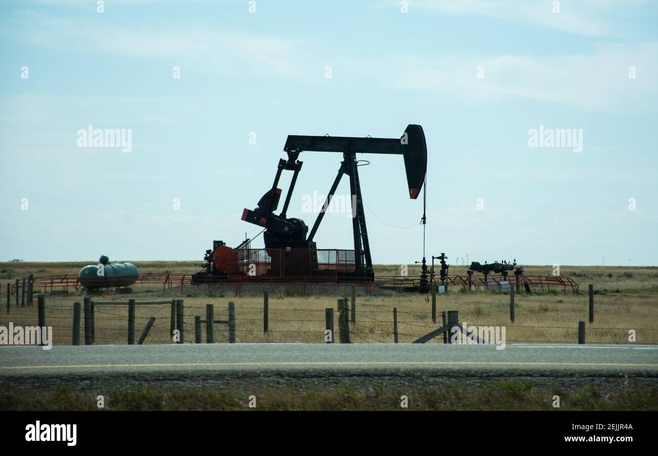 Oil excavator on an industrial site Stock Photo - Alamy