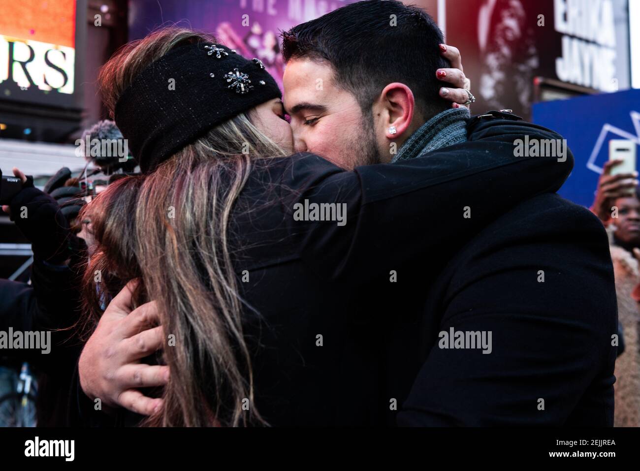 Adrian Lopez kisses his fiancée Claudia Sofia after he proposed to her ...