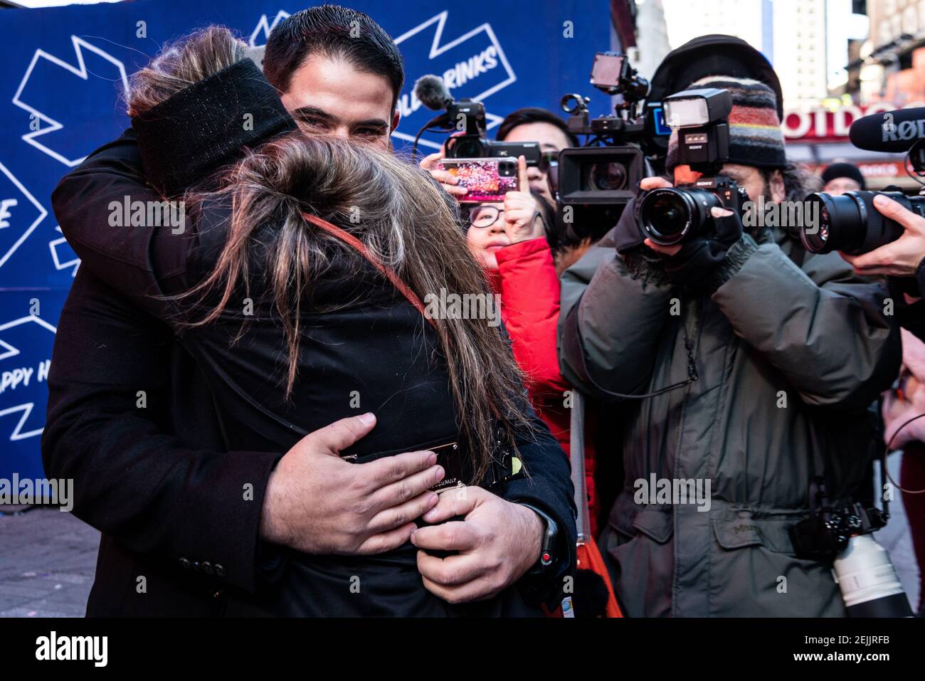 Adrian Lopez kisses his fiancée Claudia Sofia after he proposed to her on Valentine's Day in ...