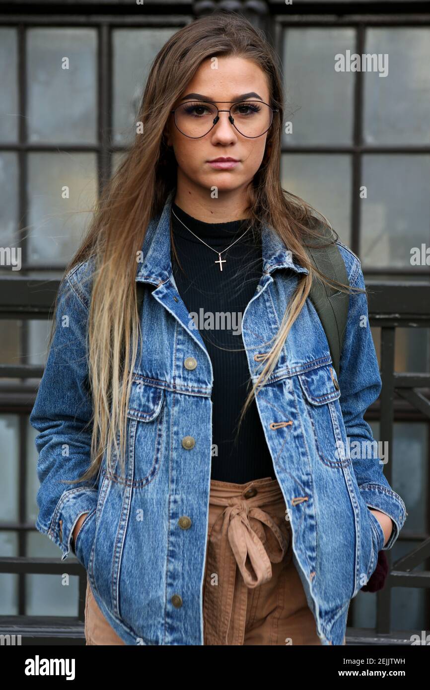 Fashion Enthusiast poses for a photo as she attends the London Fashion ...