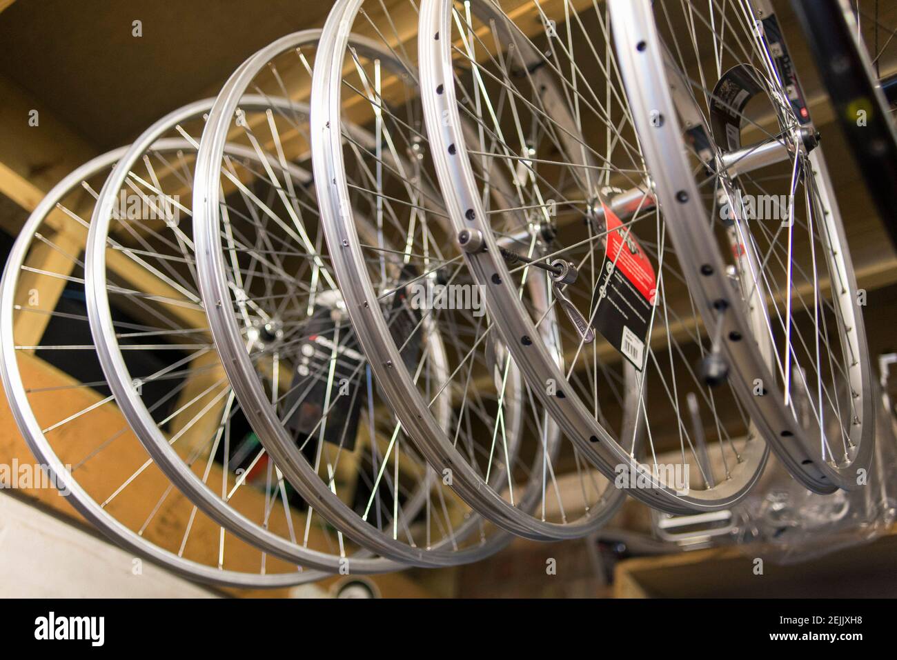 Lots of bike wheels and parts in stock for a cycle repair business ...