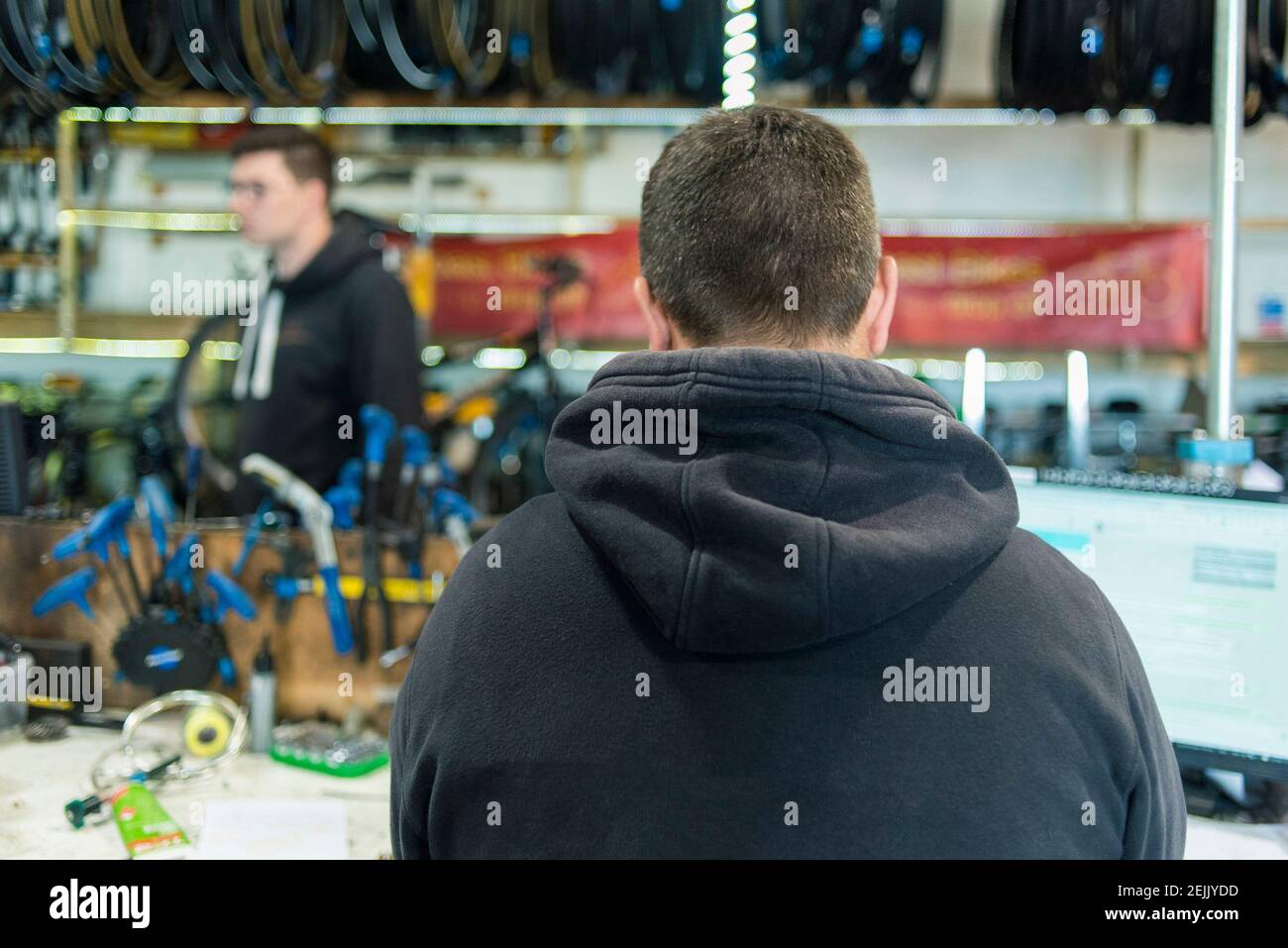 Mechanic works on bike hi-res stock photography and images - Alamy