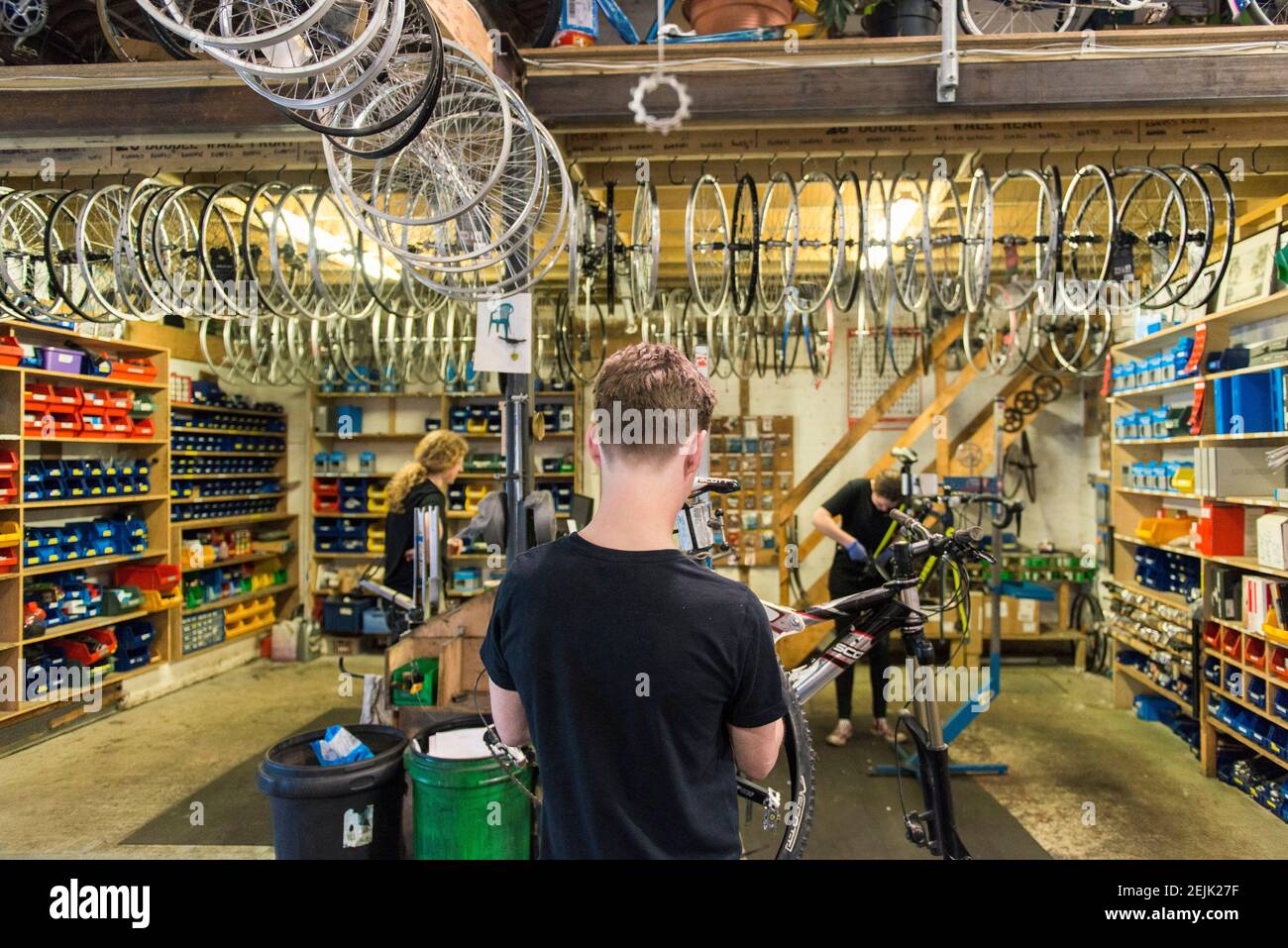 Mechanic works on bike hi-res stock photography and images - Alamy