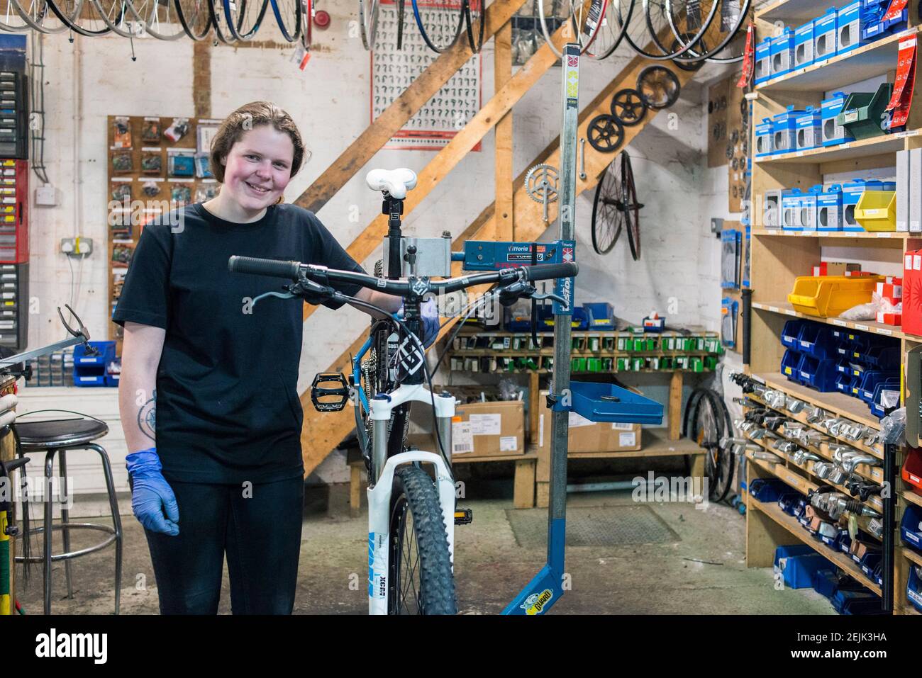 Mechanic works on bike hi-res stock photography and images - Alamy