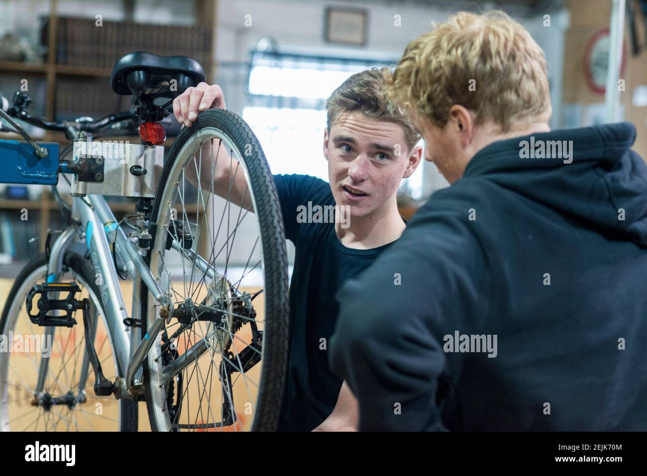 Mechanic works on bike hi-res stock photography and images - Alamy
