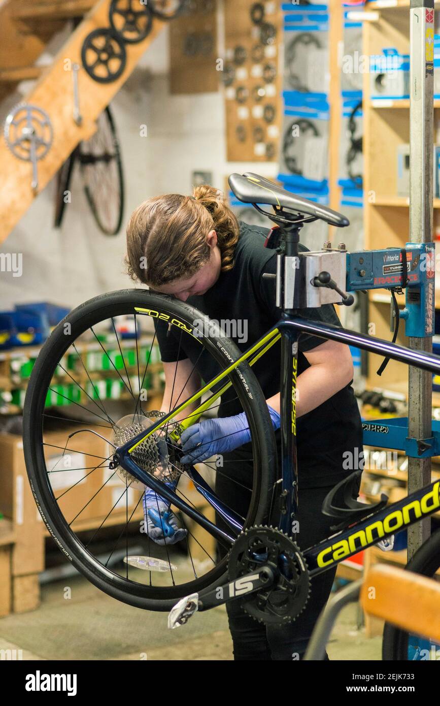 Mechanic works on bike hi-res stock photography and images - Alamy