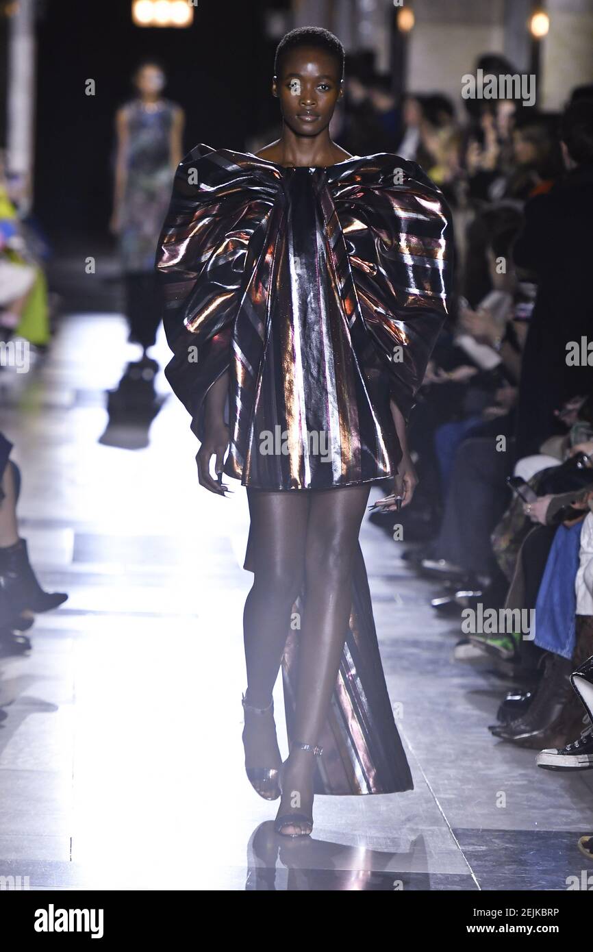 Model walks on the runway at the Mark Fast fashion show during Fall ...