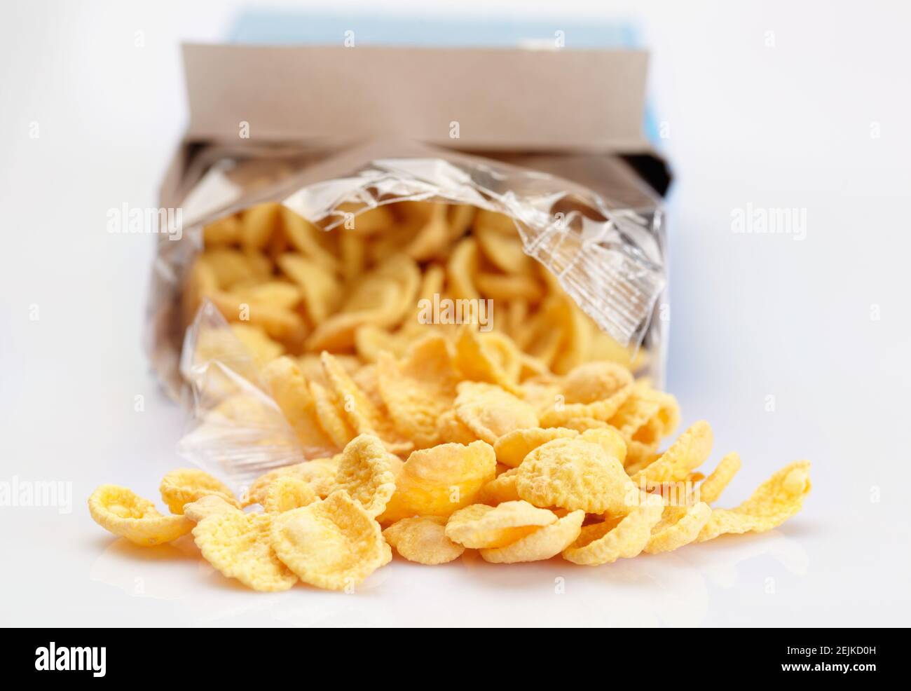 Open pack of corn flakes. Close-up Stock Photo - Alamy