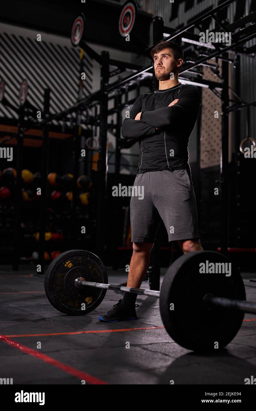 Handsome athlete stands weight hi-res stock photography and images - Alamy