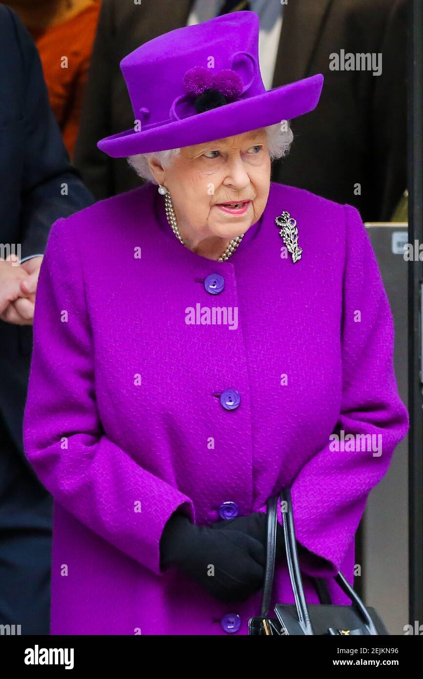 Queen Elizabeth II wearing bright purple calf-length coat and purple ...