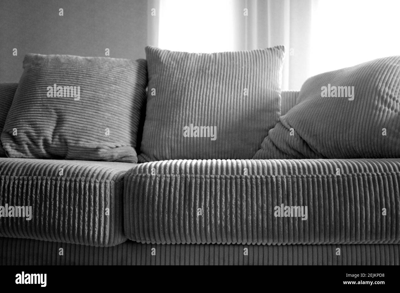 Cushions on a couch in a living room Black and White Stock Photos ...