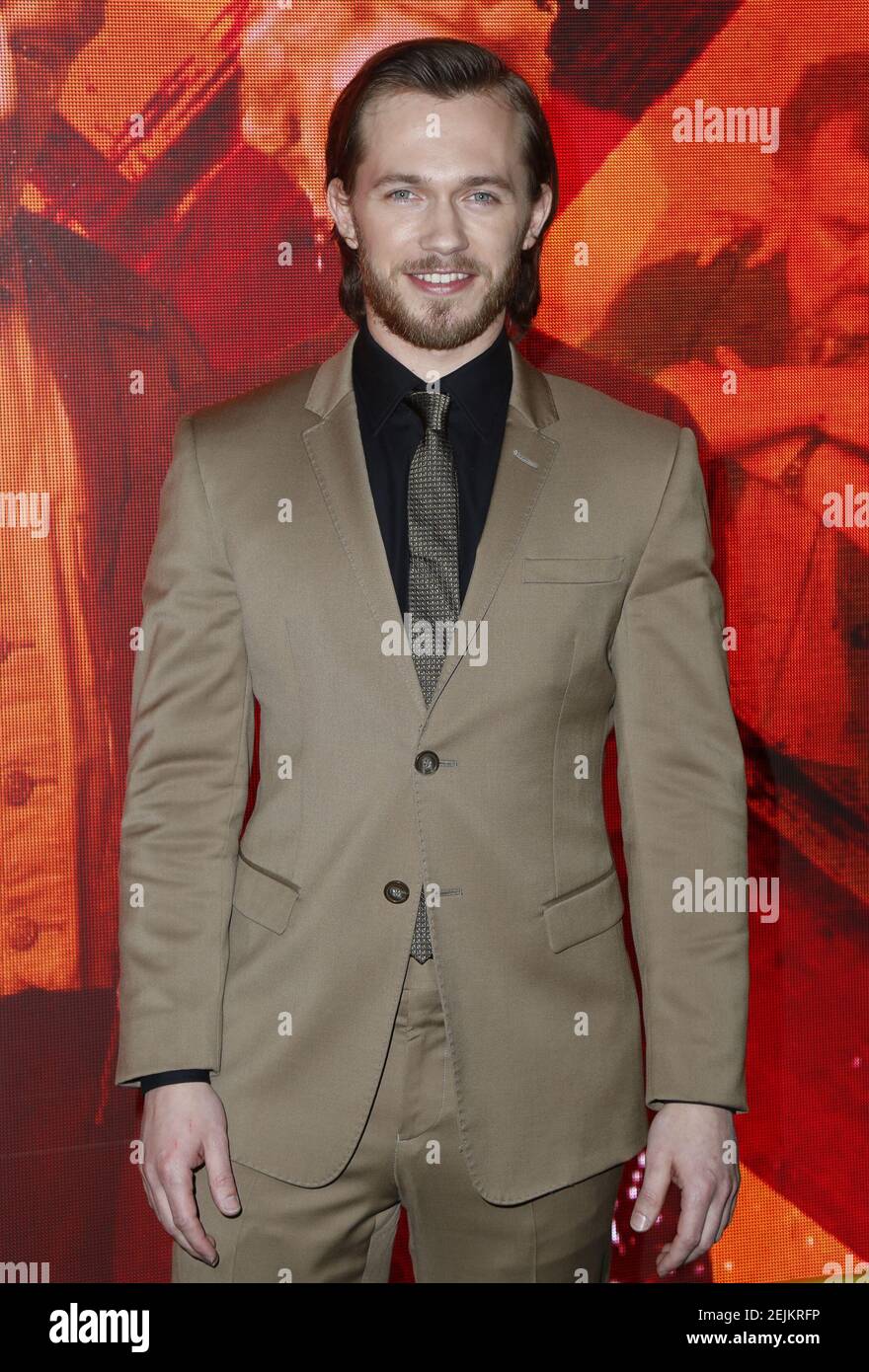 Greg Austin walking the red carpet at the Premiere of Amazon Prime ...