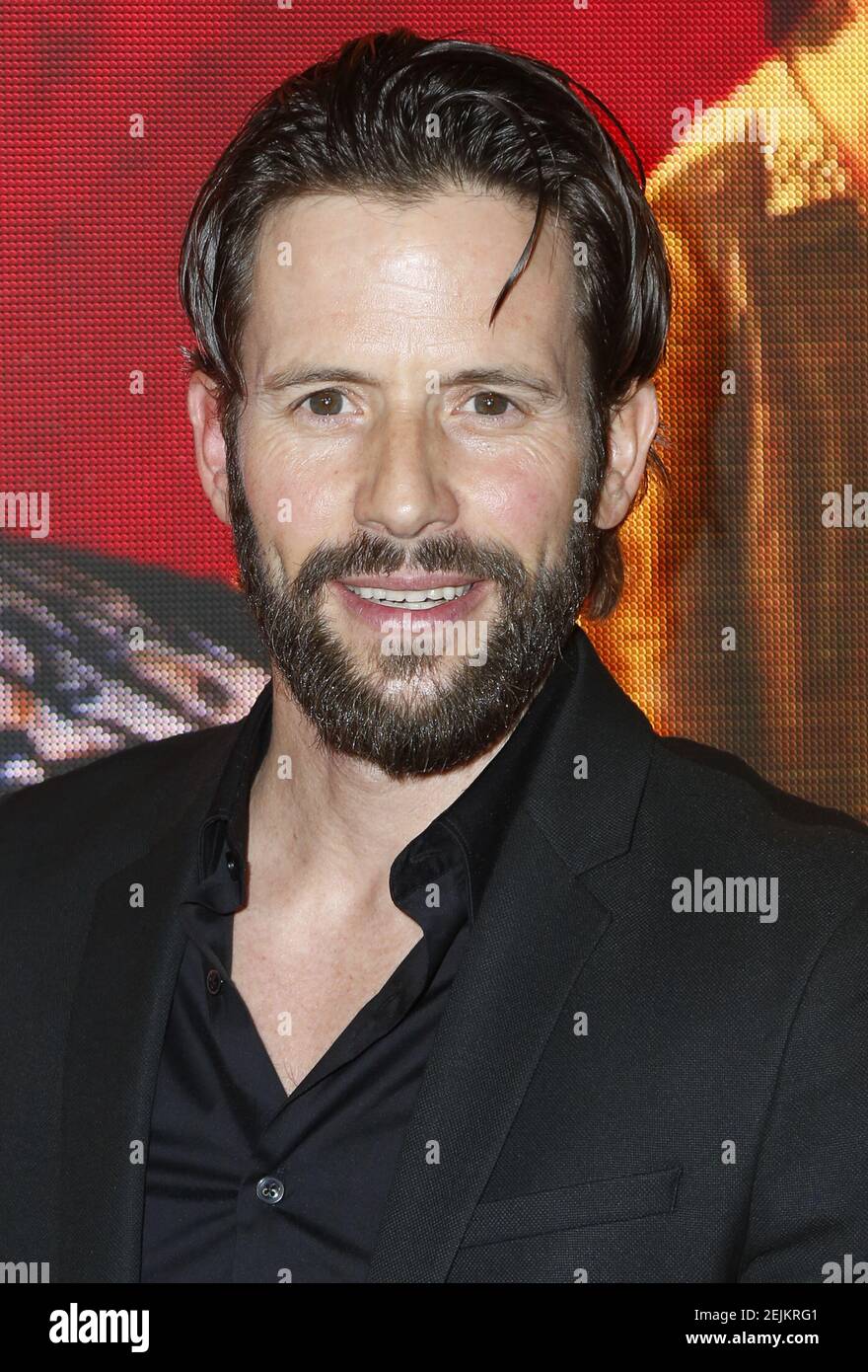Christian Oliver walking the red carpet at the Premiere of Amazon Prime ...