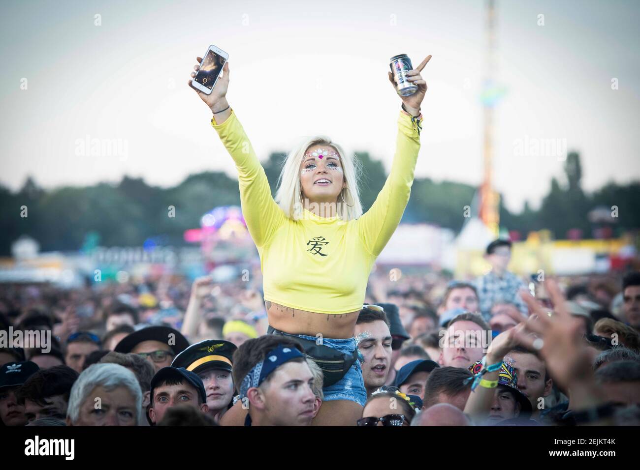 A festival goer at the isle of wight festival hi-res stock photography ...