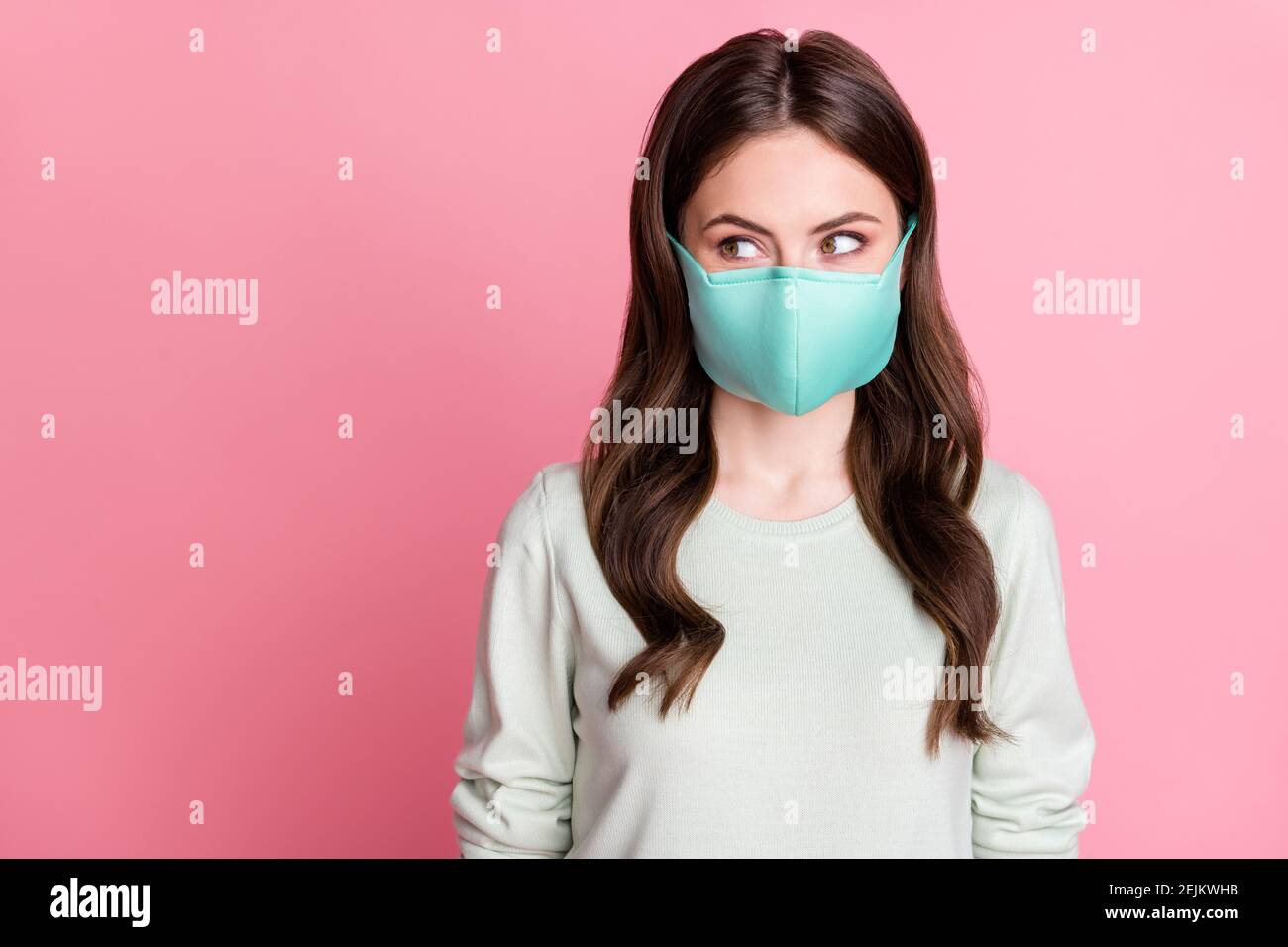 Photo of wavy hairdo person look empty space wearing medical safe face ...