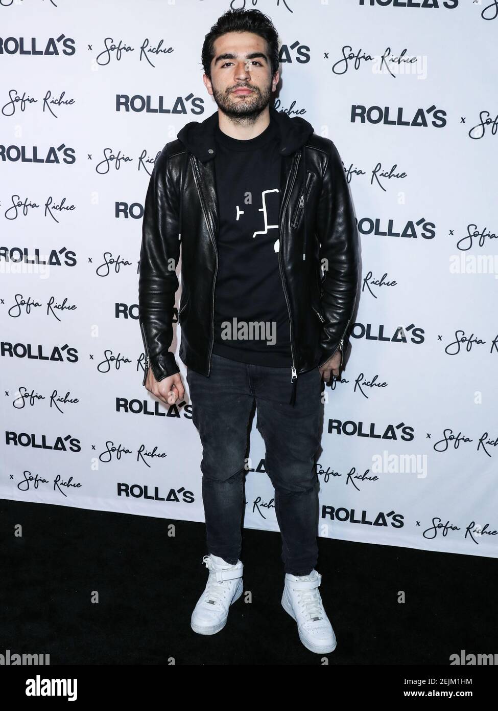 WEST HOLLYWOOD, LOS ANGELES, CALIFORNIA, USA - FEBRUARY 20: Simon ...