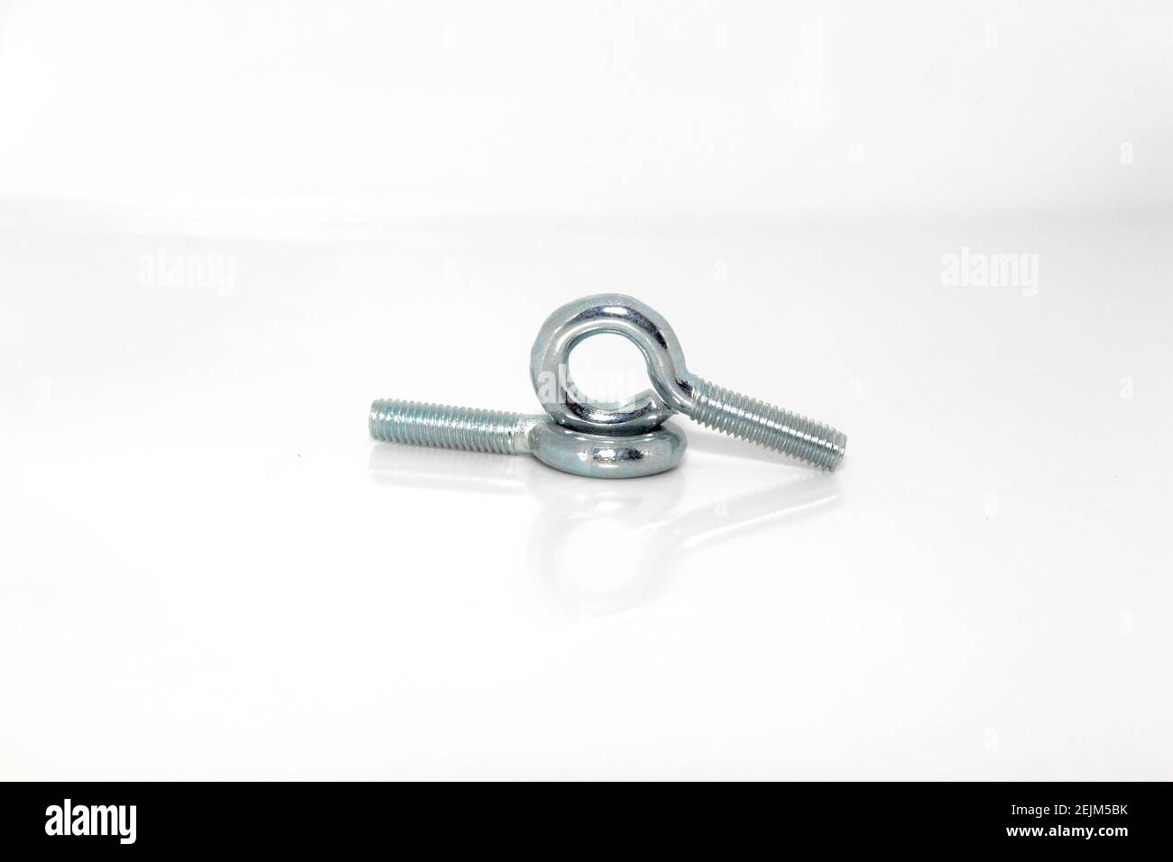A couple of isolated industrial galvanized eye bolts Stock Photo - Alamy