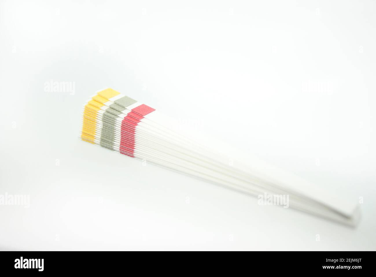 Isolated pH indicator paper on white background Stock Photo - Alamy