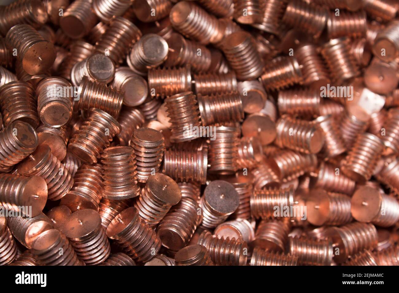 Pile of threaded copper metal screw bolts Stock Photo - Alamy