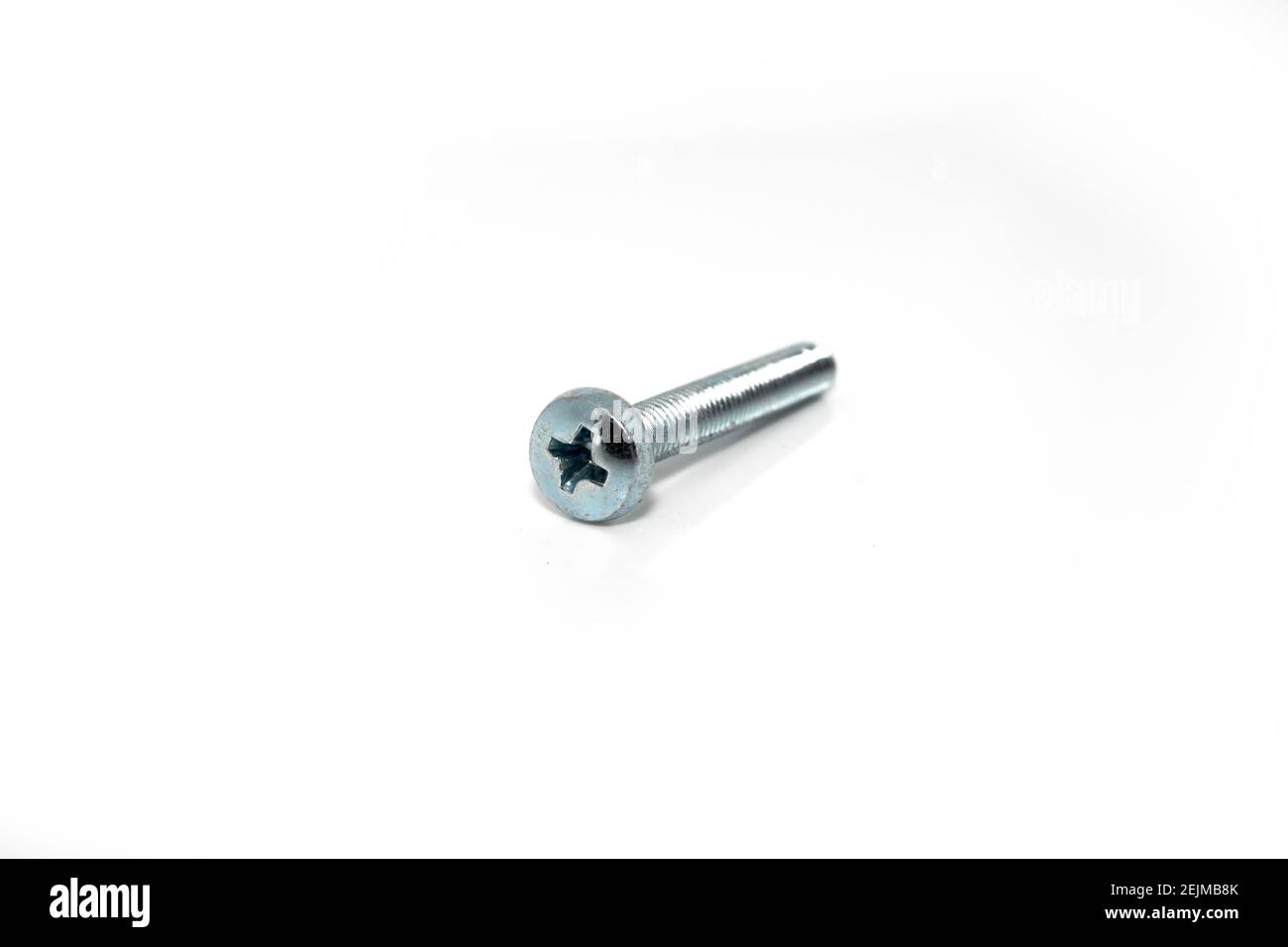Single isolated galvanized industrial steel screw on white background ...