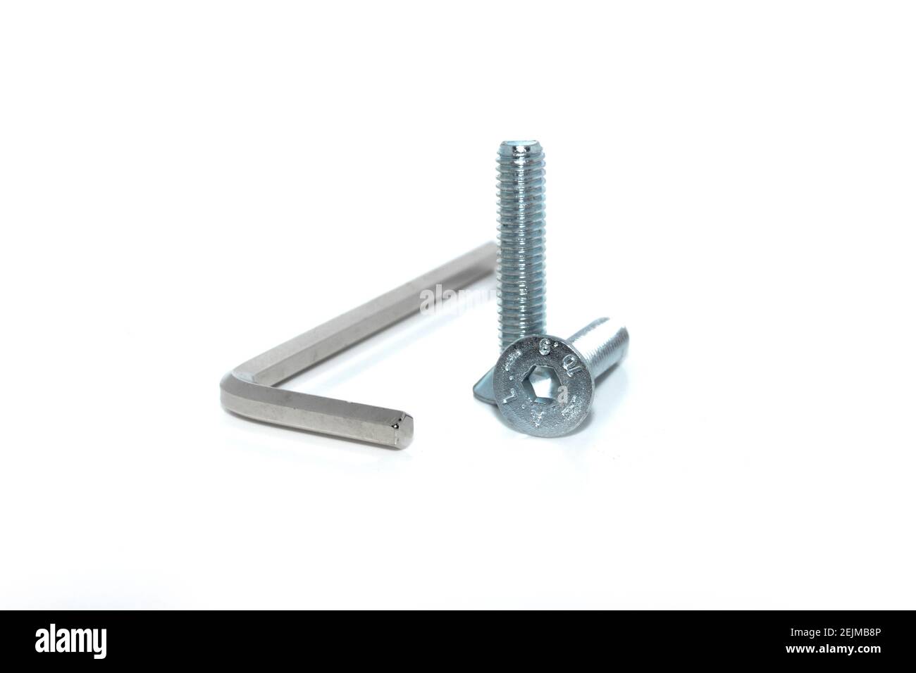 Single isolated Allen screw driver wrench with a couple of screws on ...