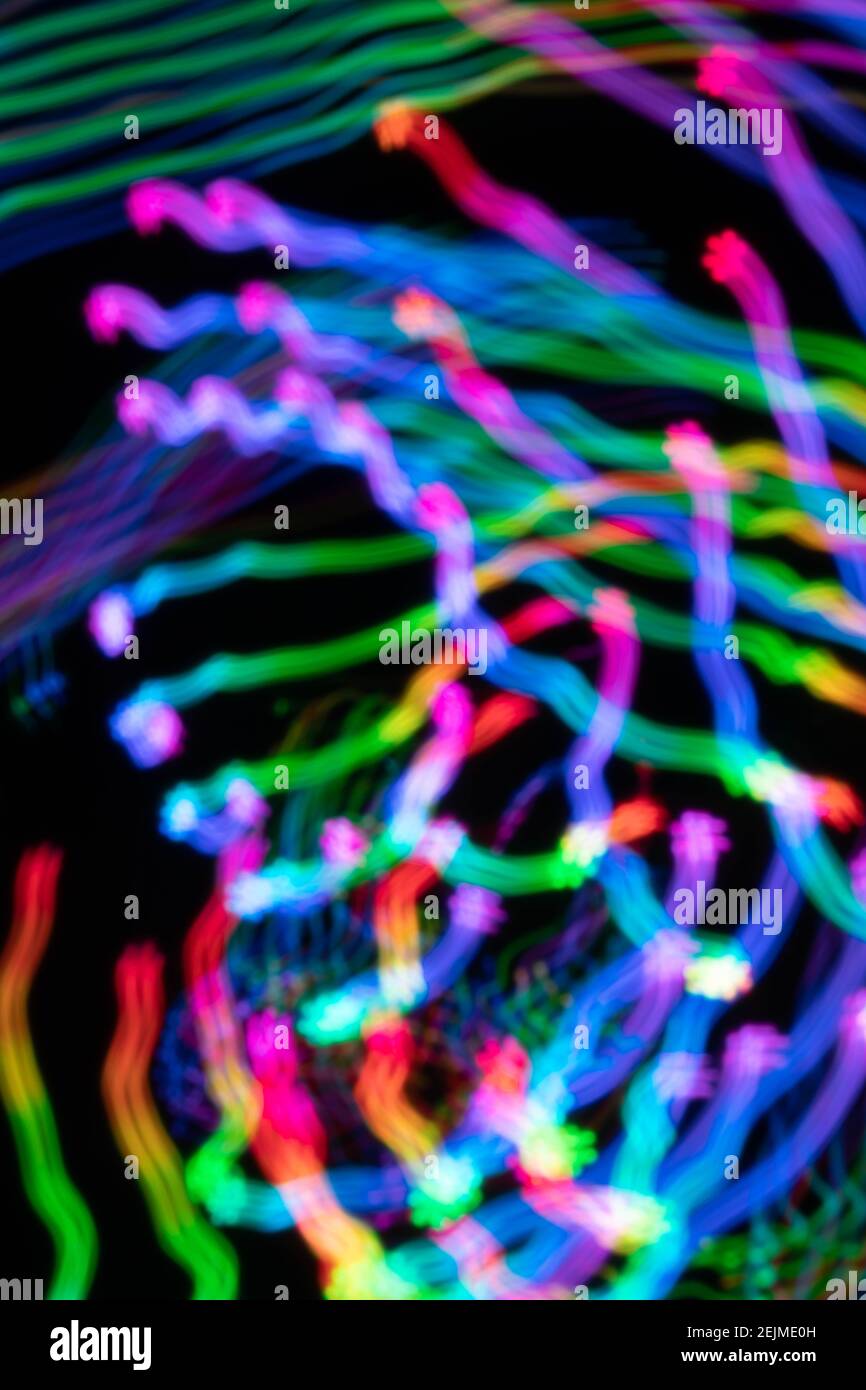 defocused background with colored lights Stock Photo - Alamy