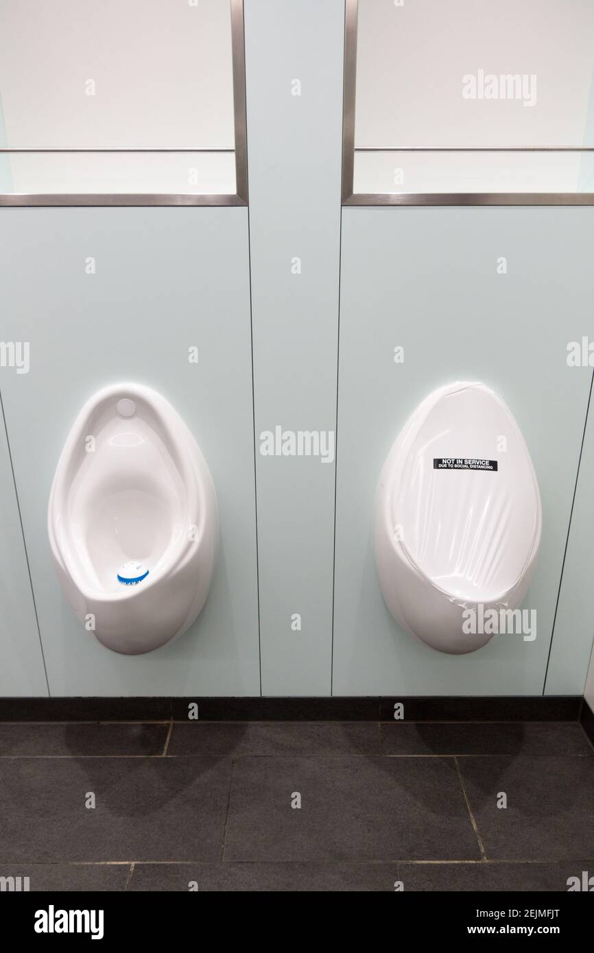 Social distancing in Mens toilet Stock Photo - Alamy