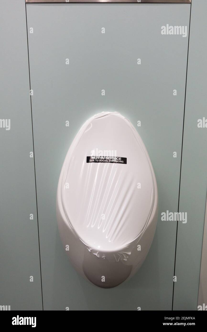 Social distancing in Mens toilet Stock Photo - Alamy