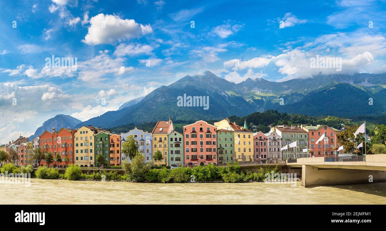 Building facade and Alps mountains behind in Innsbruck in a beautiful ...