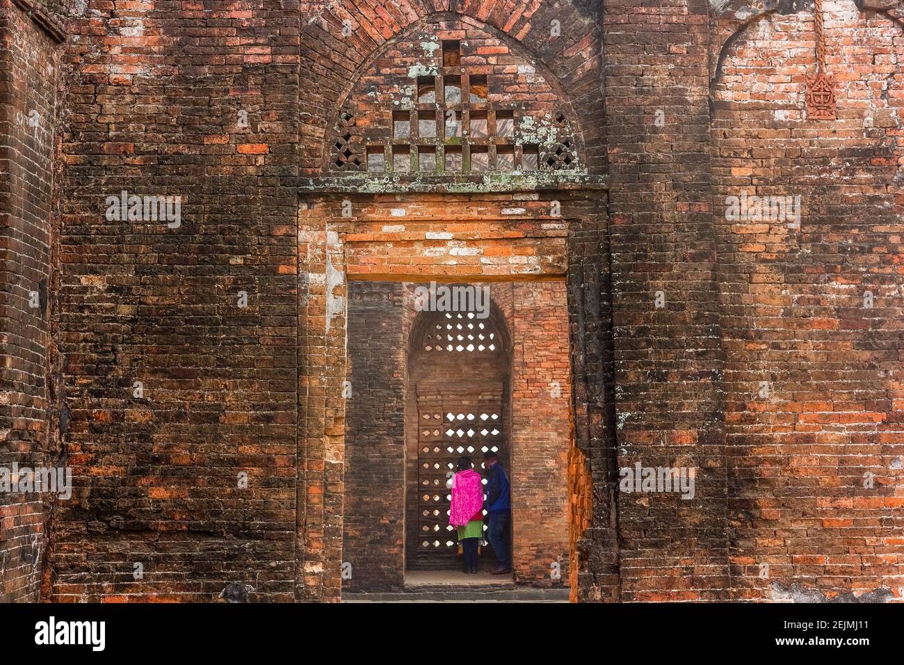 Malda, West Bengal, India - January 2018: Arched niches on a brick wall ...