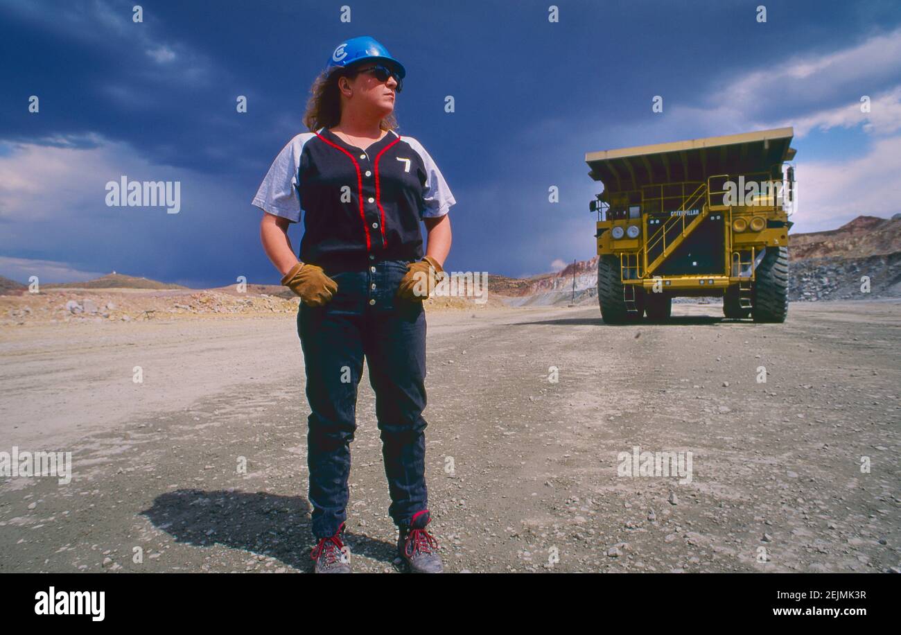 A female giant dump truck operator at an open pit copper mine in ...