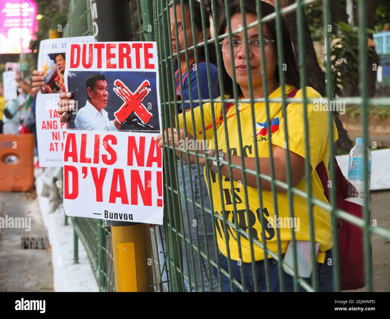 A protester holds a placard during the demonstration. Members of ...