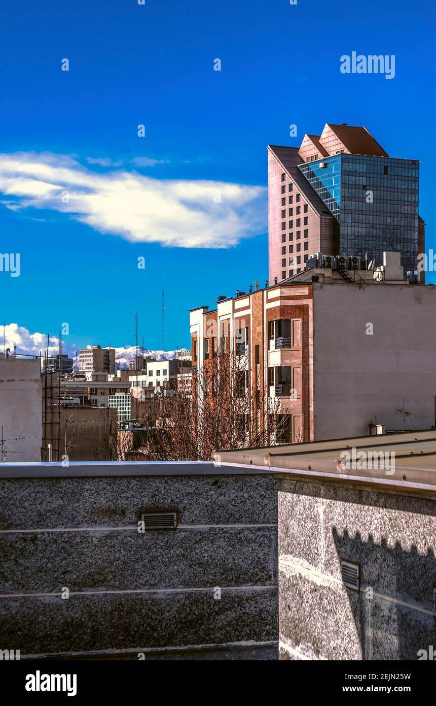 High rise building snow mountains hi-res stock photography and images ...