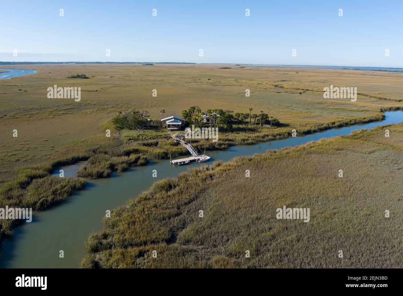 Aerial view of secluded house on low island on the coast of South ...