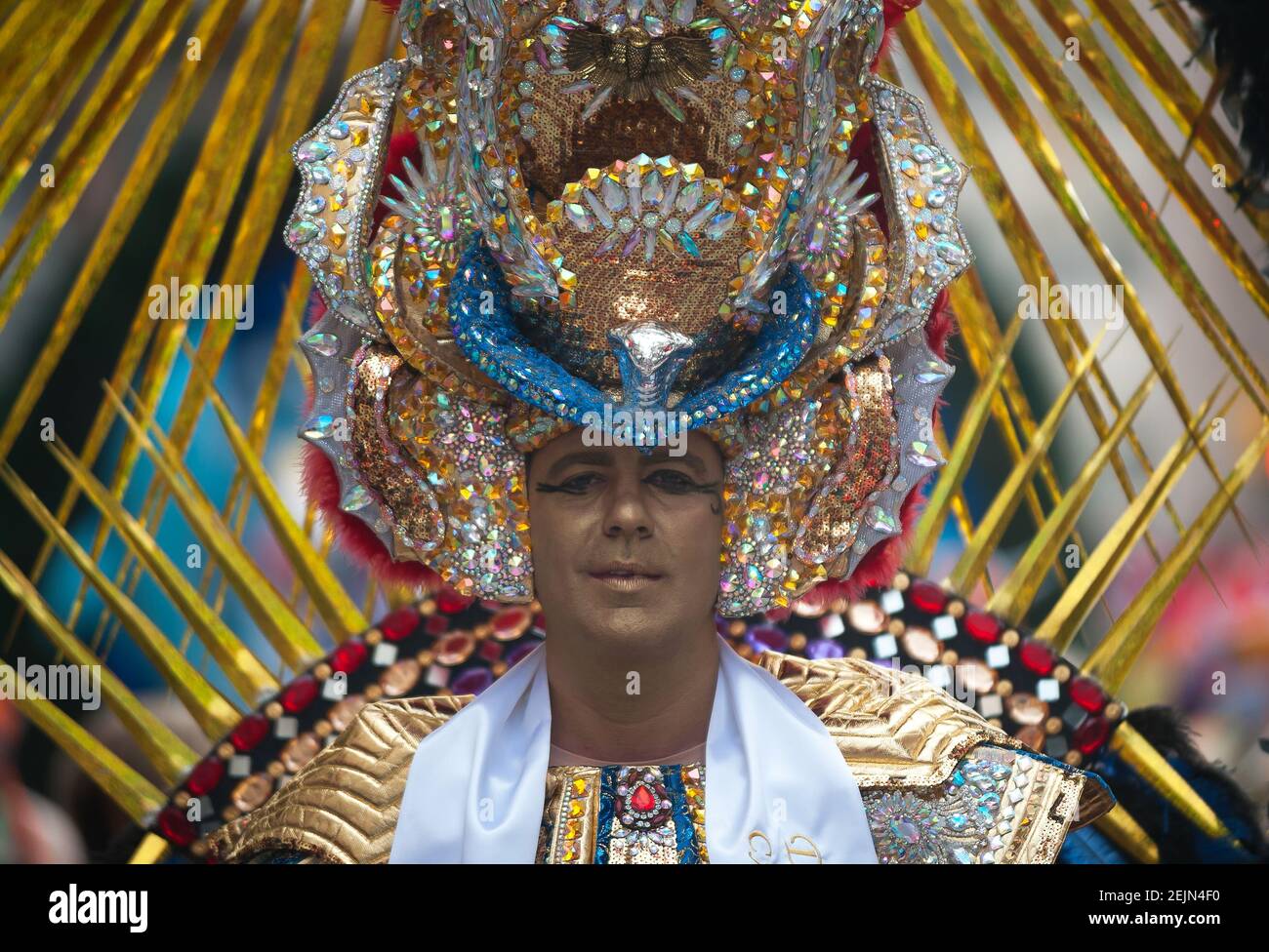 A man dressed in costume performs during the traditional carnival. The ...