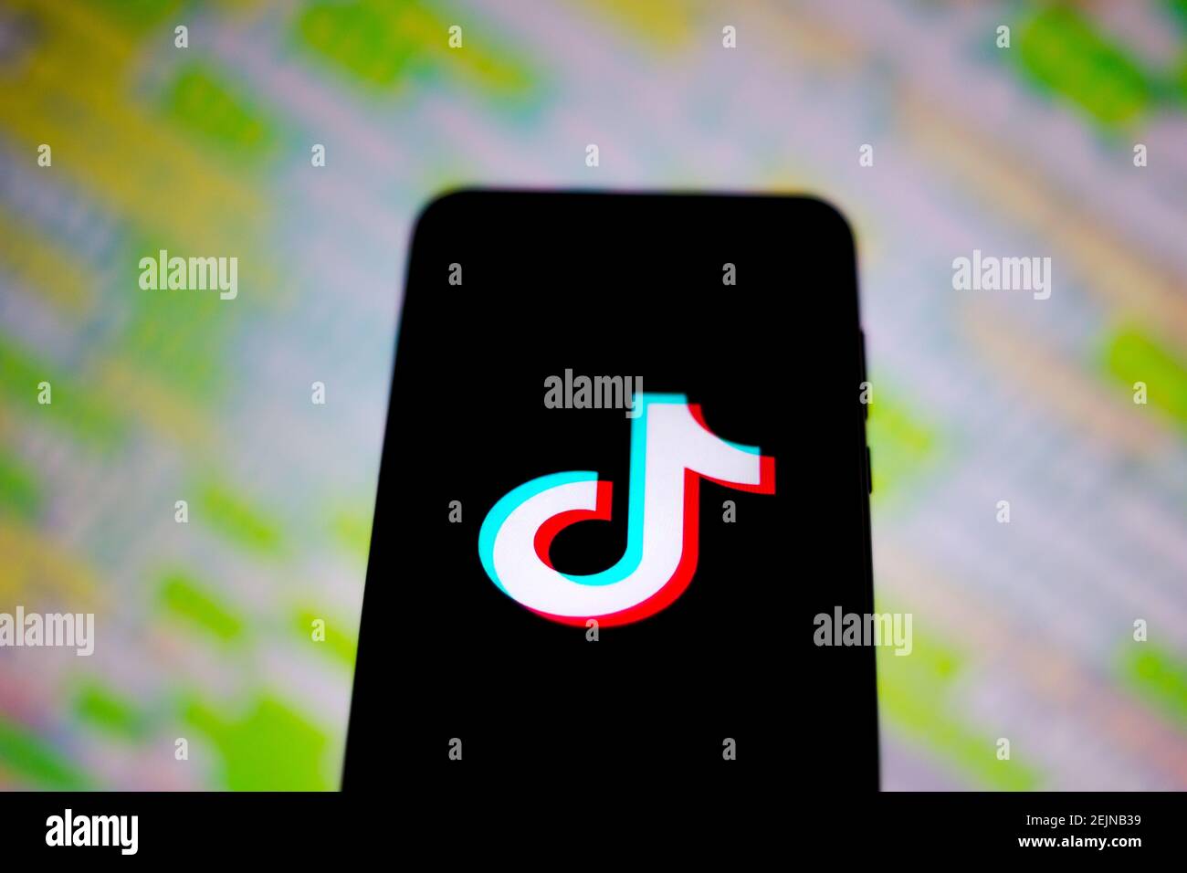 In this photo illustration a TikTok (Douyin) logo seen displayed on a ...