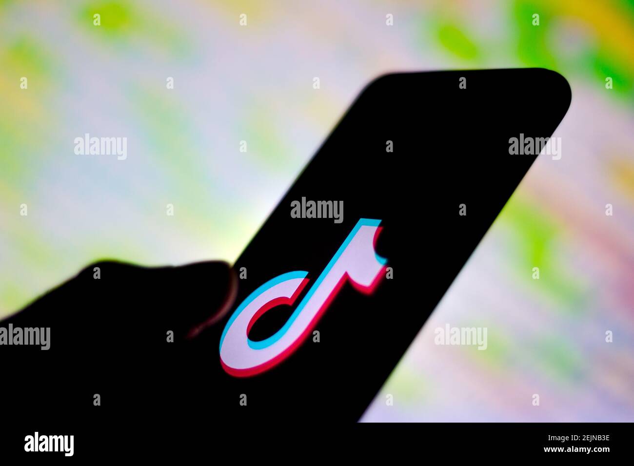 In this photo illustration a TikTok (Douyin) logo seen displayed on a ...