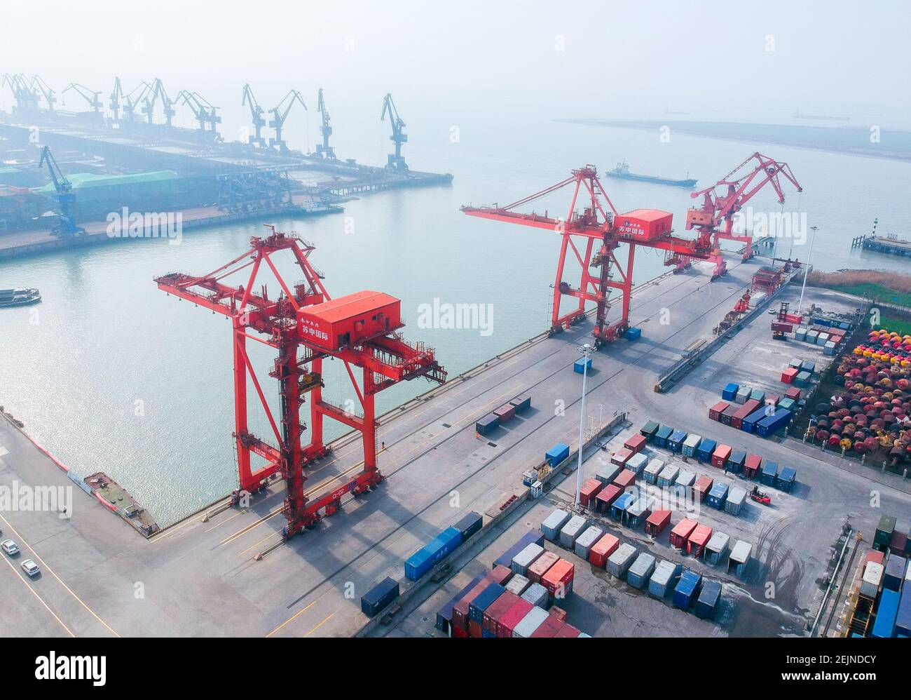 An aerial view of containers and cranes at an export port in Rugao ...