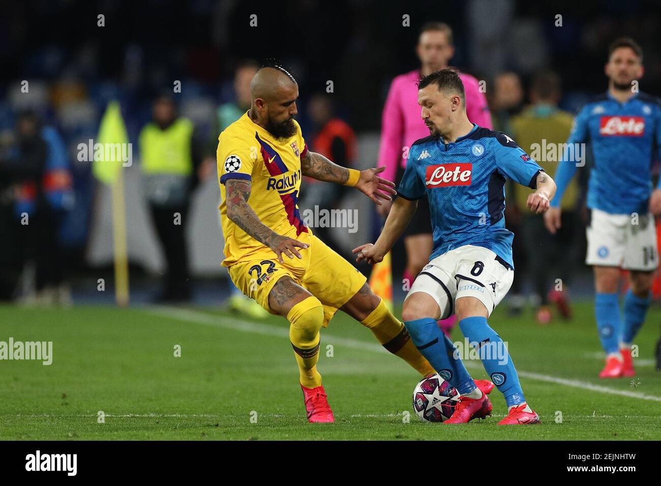 Arturo Vidal of Barcelona and Mario Rui of Napoli compete for the ball ...