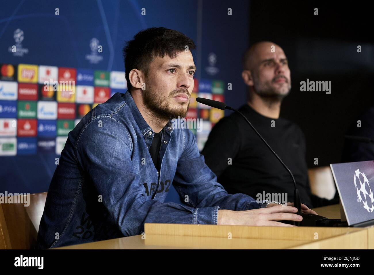 David Silva and Pep Guardiola coach of Manchester City attend the ...