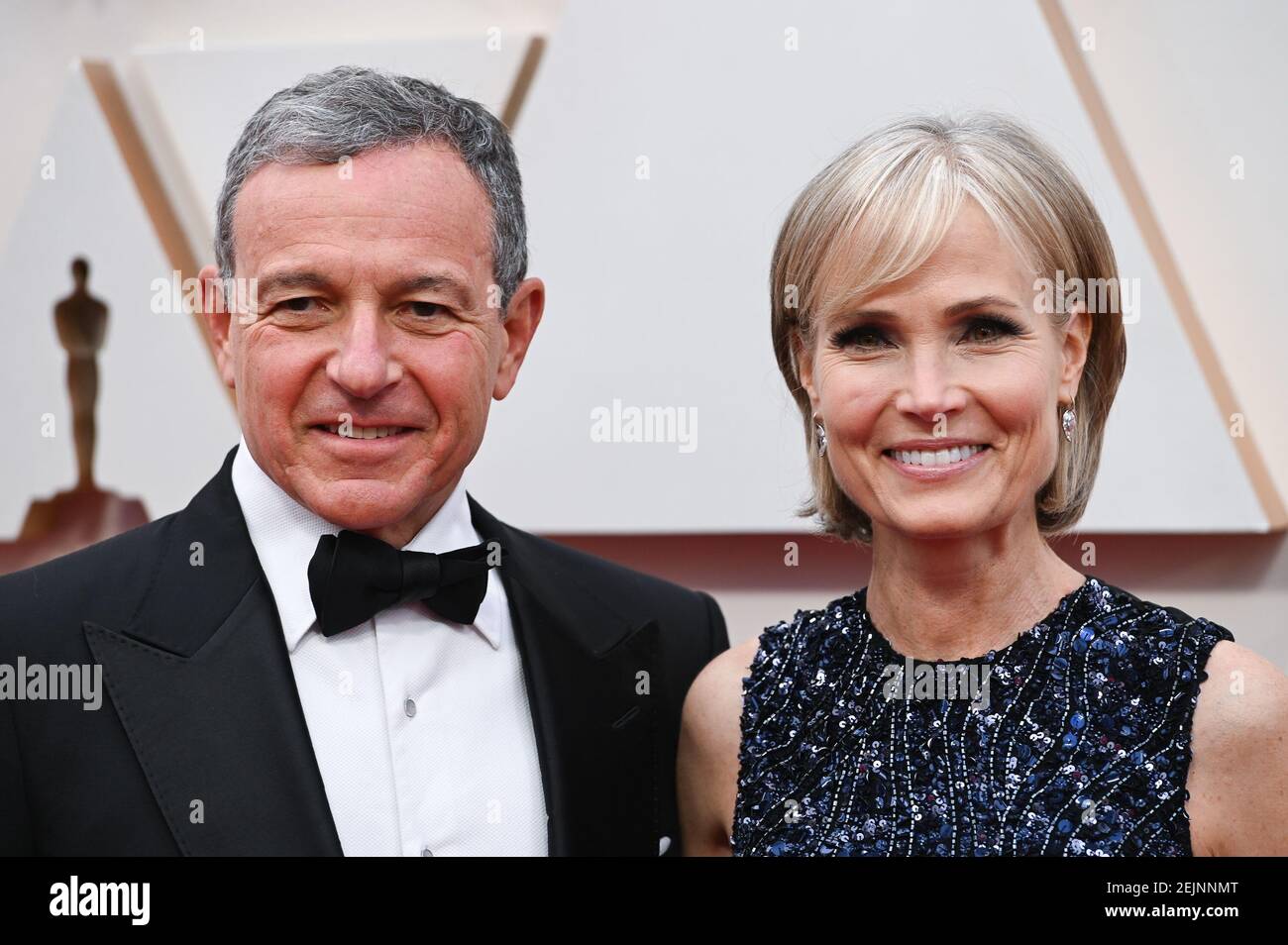 Bob Iger and Willow Bay walking on the red carpet at the 92nd Annual ...