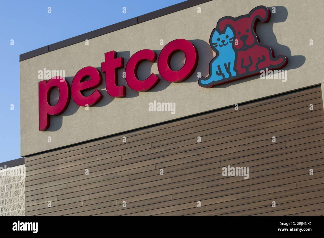 A logo sign outside of a Petco retail store location in Nottingham ...