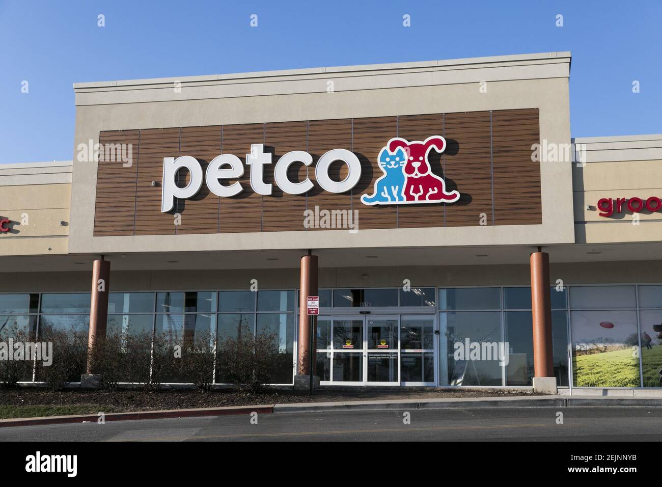A logo sign outside of a Petco retail store location in Baltimore ...