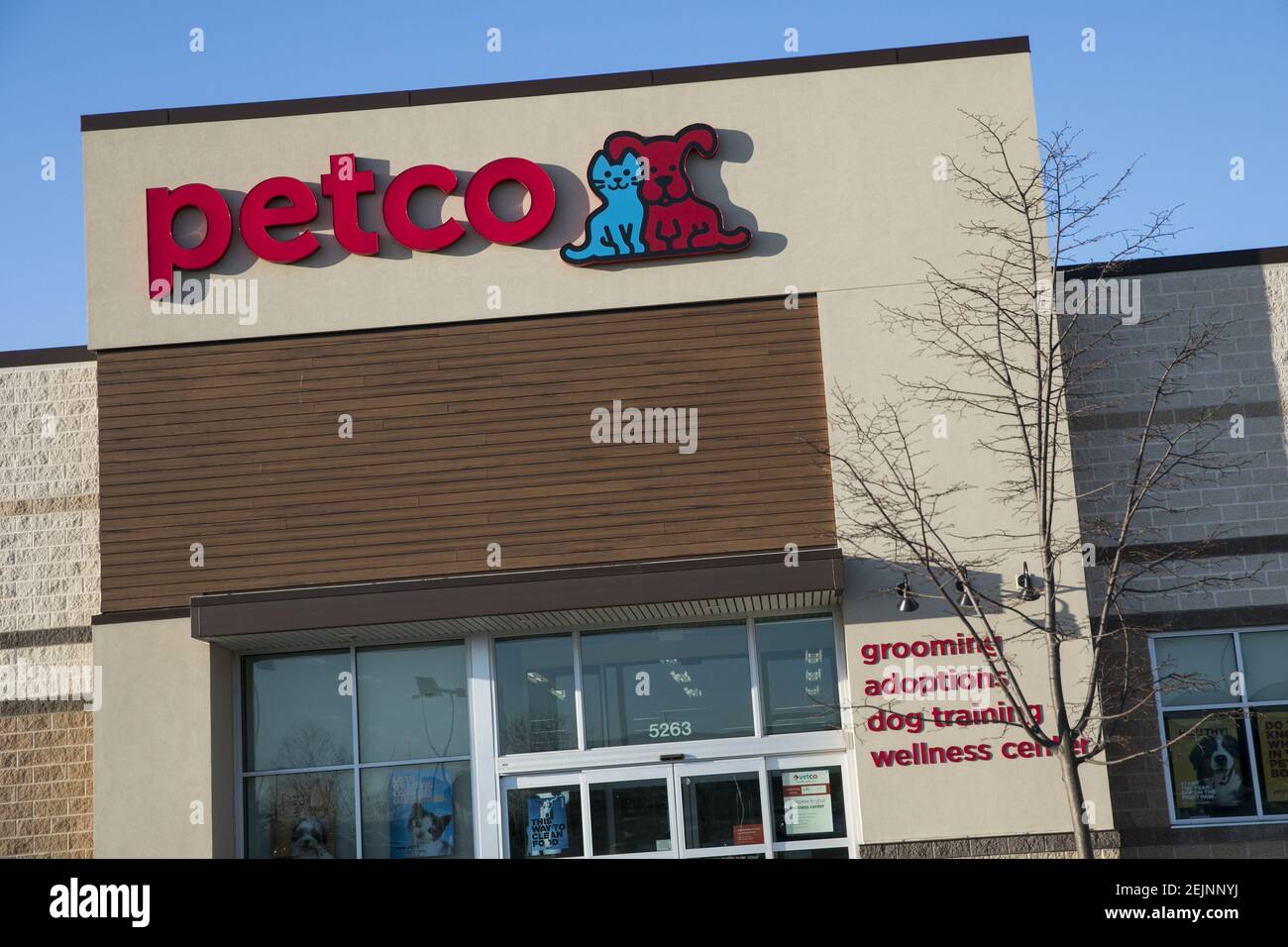 A logo sign outside of a Petco retail store location in Nottingham ...
